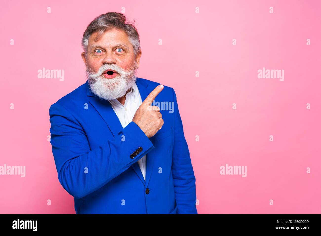 Eccentric senior man with funny expression portrait on background ...