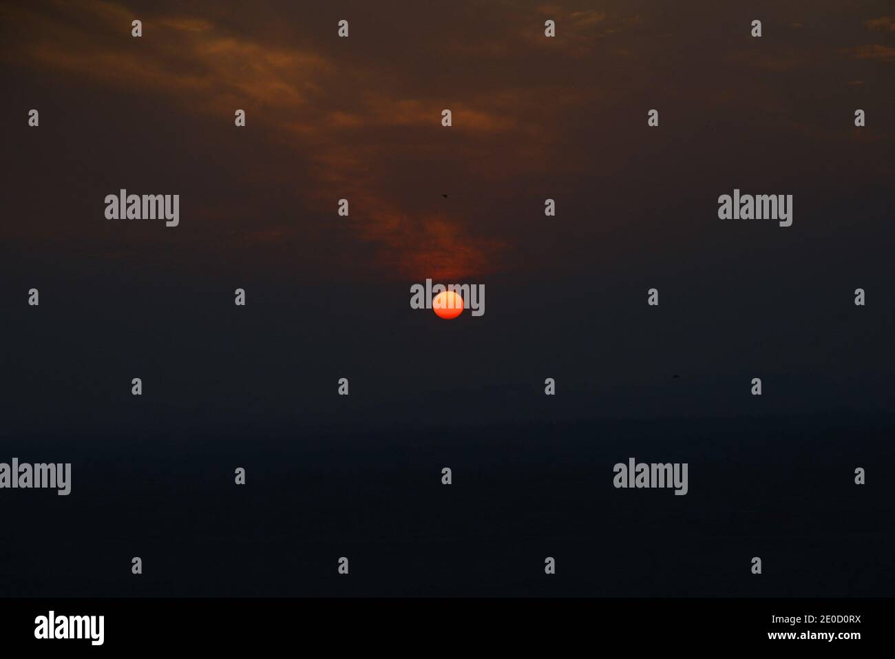 Pakistani people busy in their routine work during last sunset of the ...