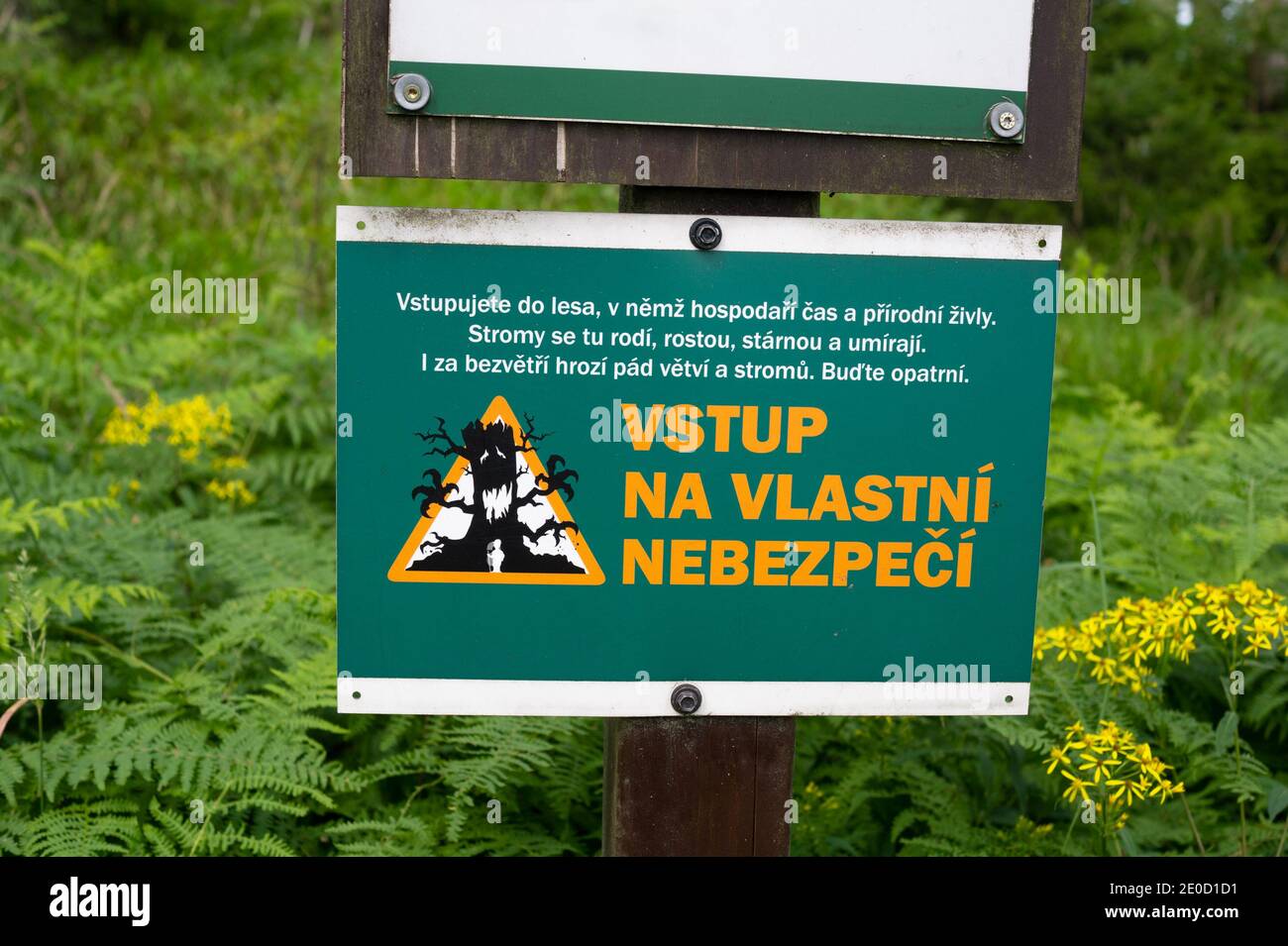 Enter at your own risk (text in czech language) - warning sign and ...