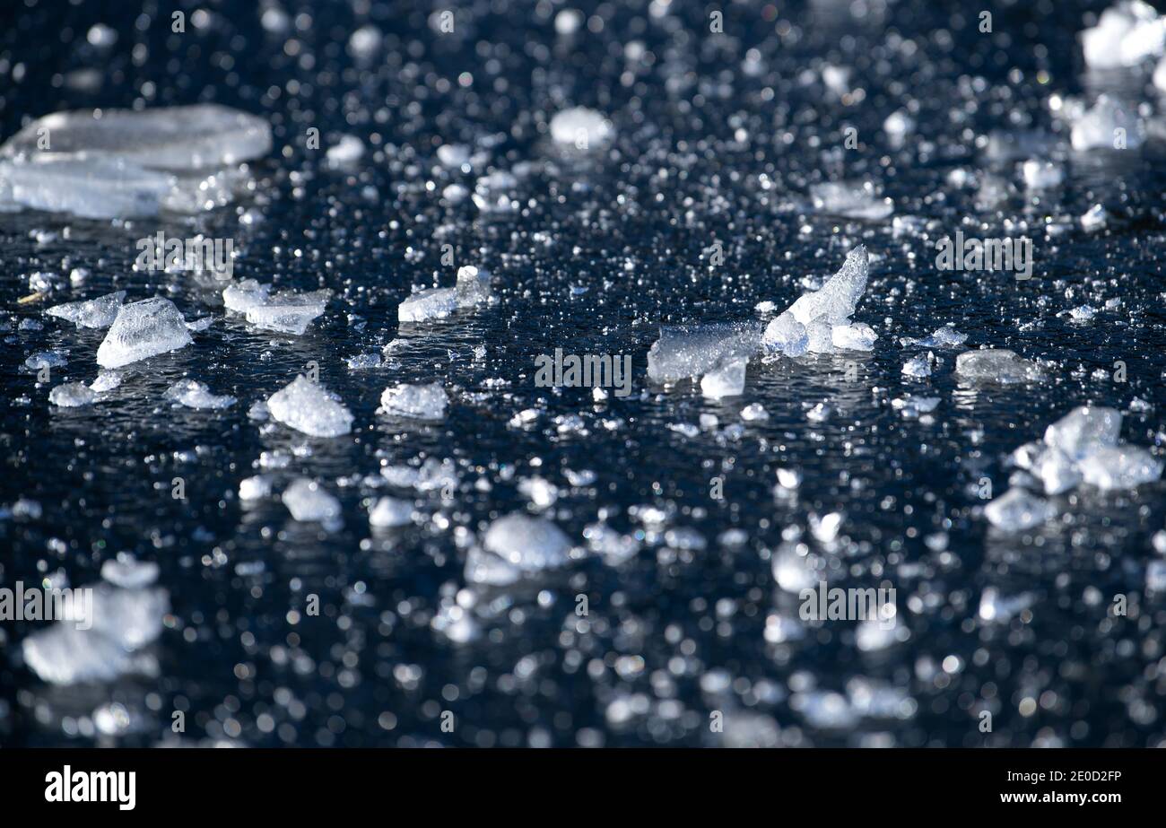 Munich, Germany. 31st Dec, 2020. Small pieces of ice lie on the ...