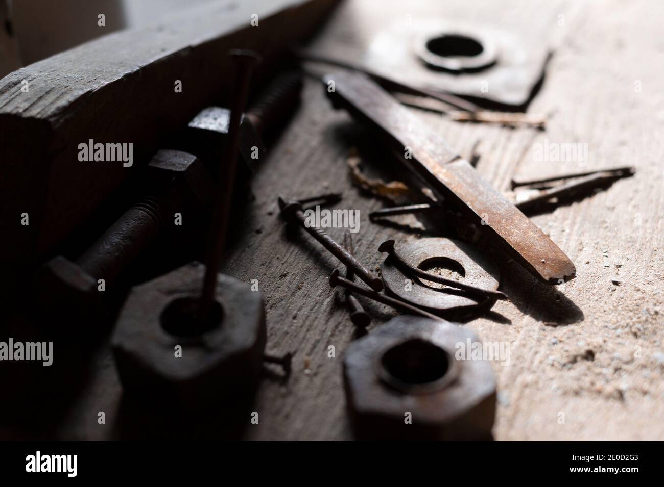 Detail from abandoned workshop - dirty, rusty and corroded nail ...