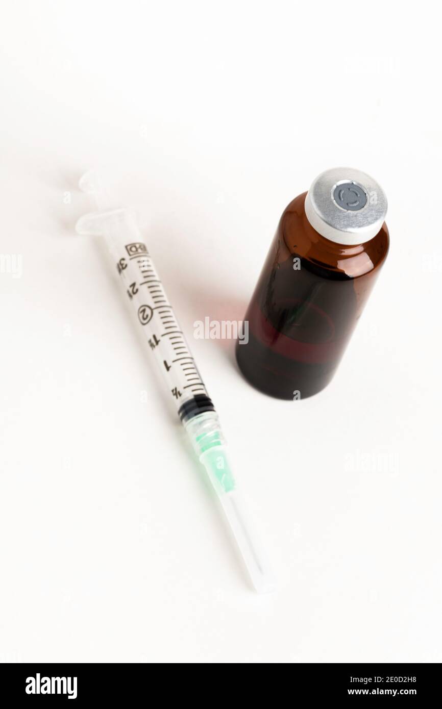 A close-up shot of a hygienic single-use plastic disposable medicine ...