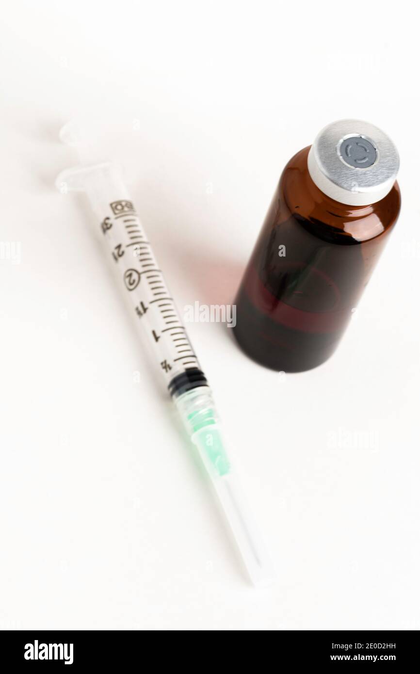 A close-up shot of a hygienic single-use plastic disposable medicine ...