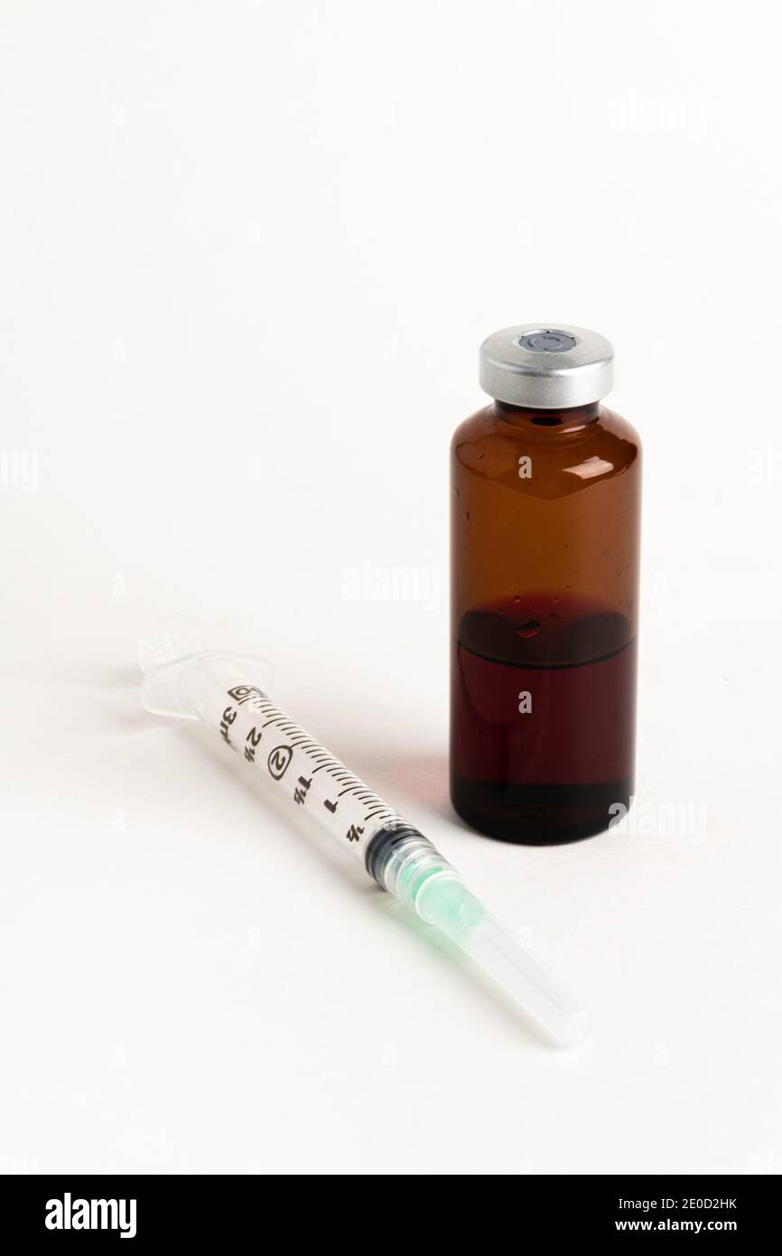 A close-up shot of a hygienic single-use plastic disposable medicine ...