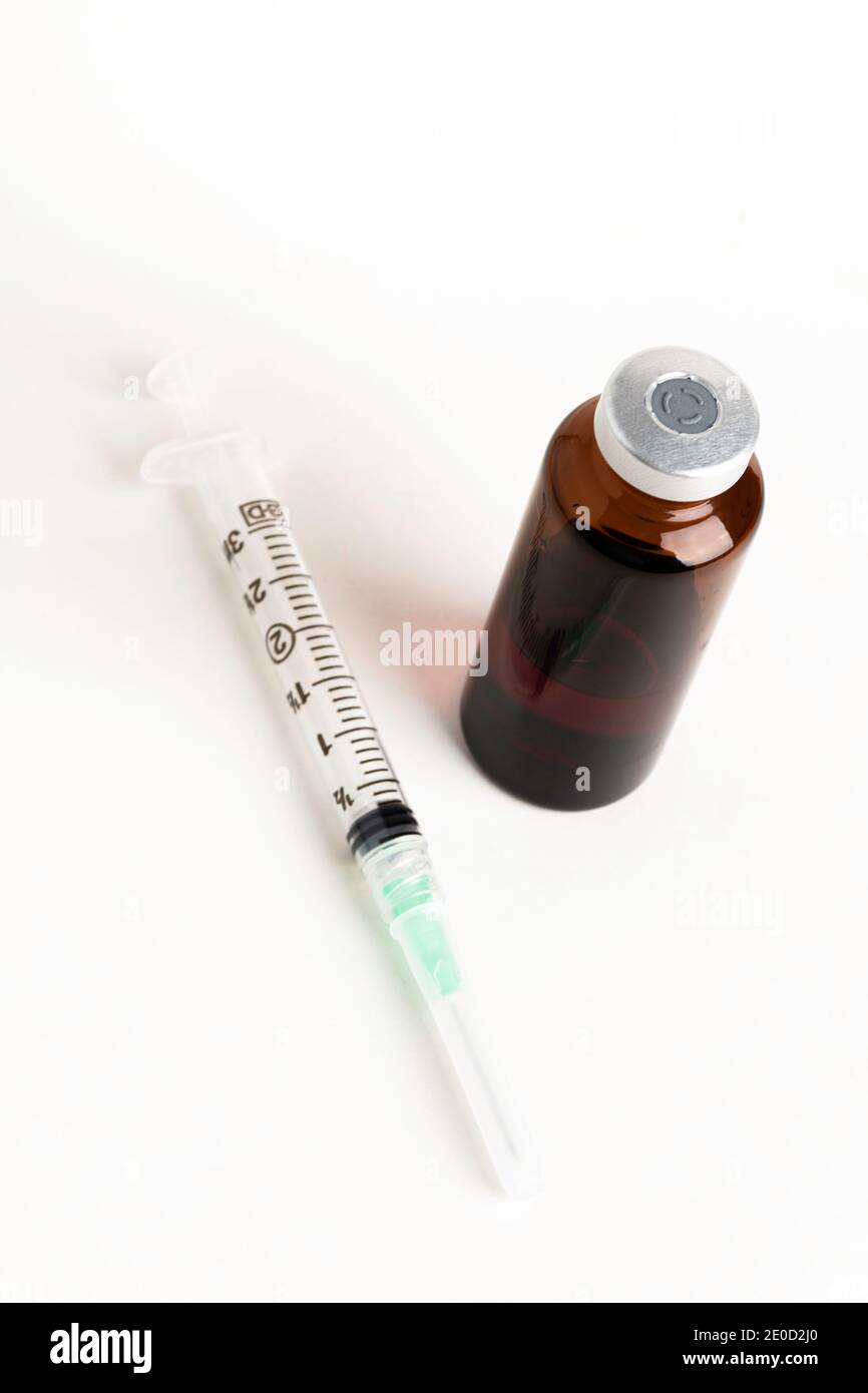 A close-up shot of a hygienic single-use plastic disposable medicine ...