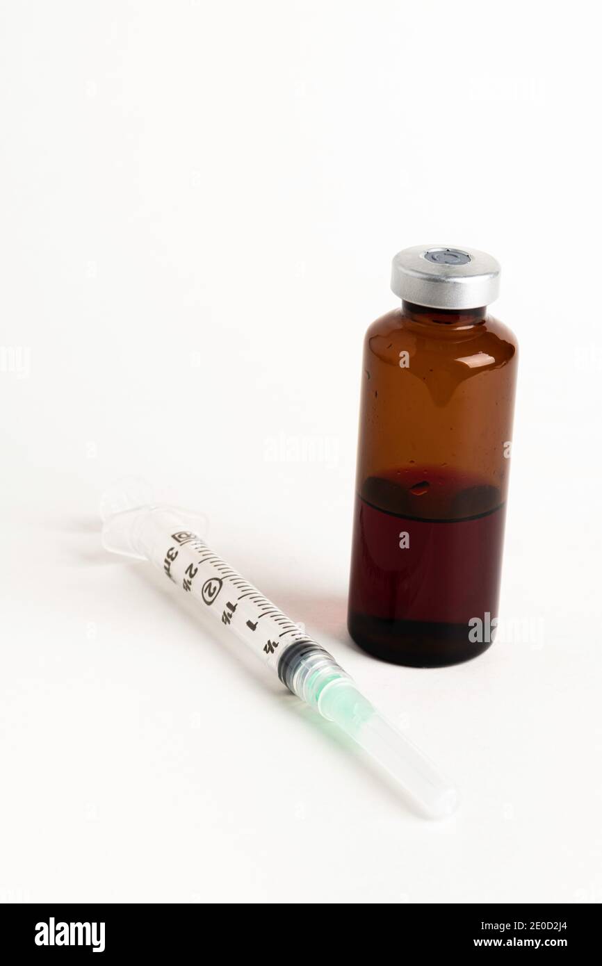 A close-up shot of a hygienic single-use plastic disposable medicine ...