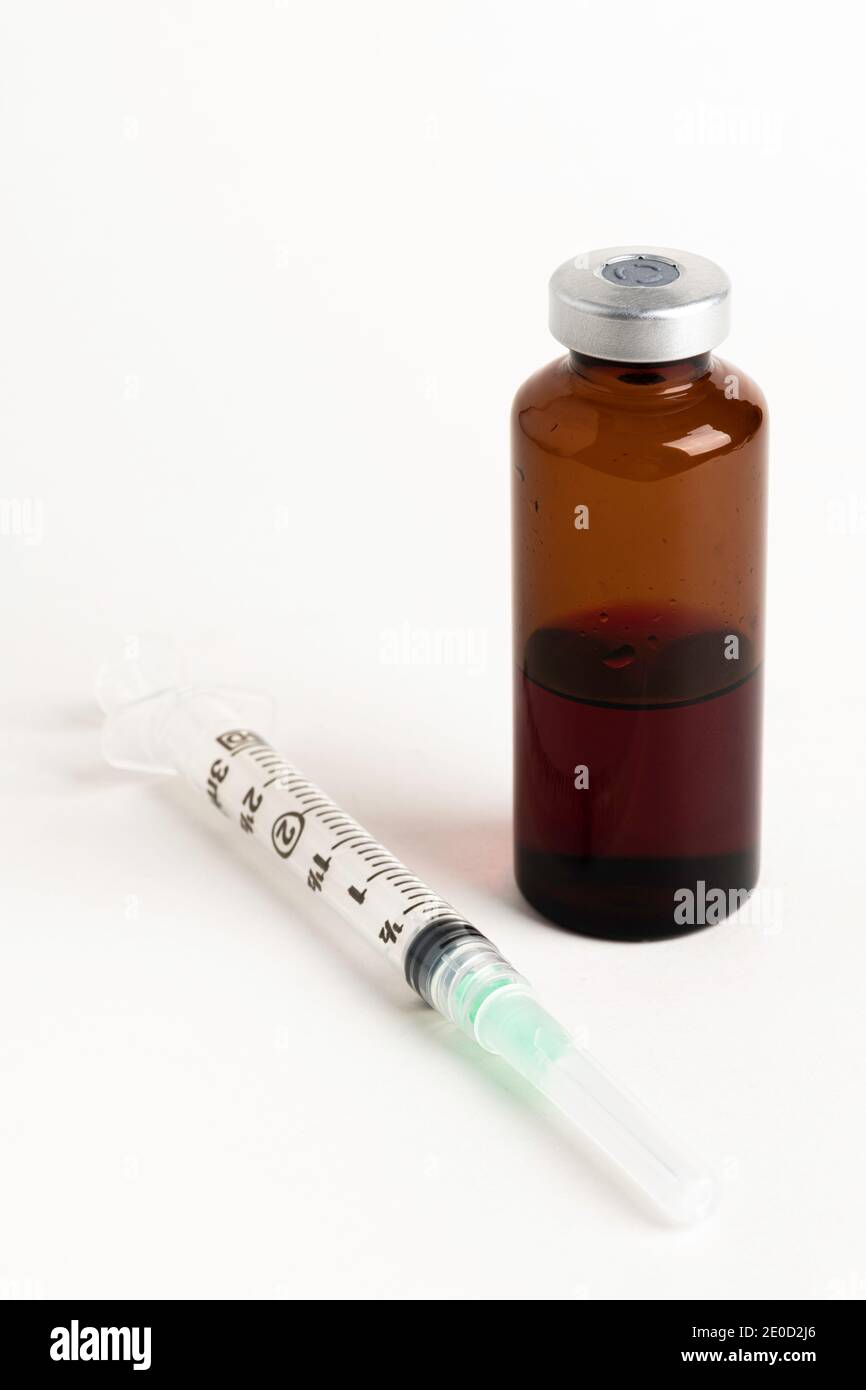 A close-up shot of a hygienic single-use plastic disposable medicine ...