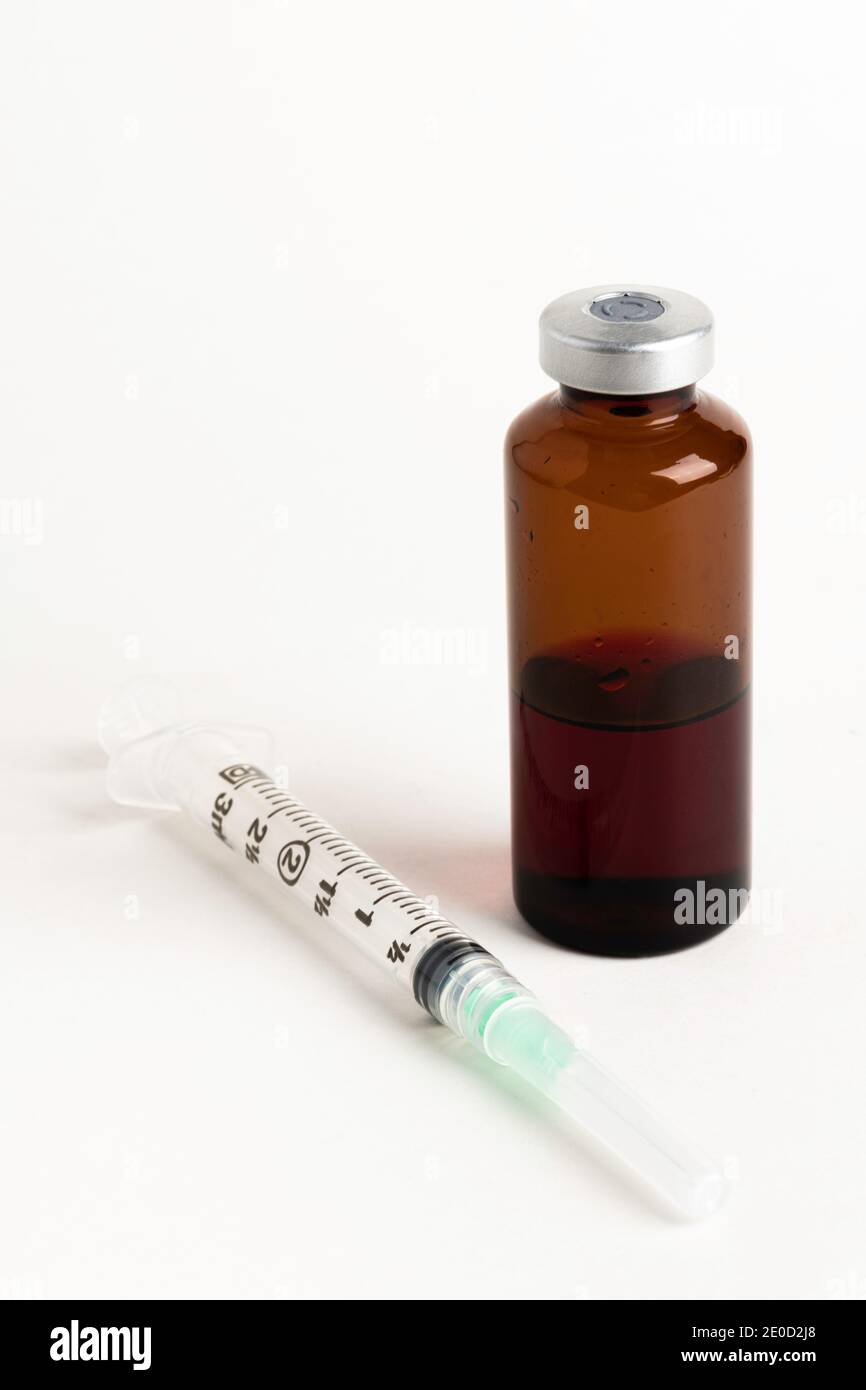 A close-up shot of a hygienic single-use plastic disposable medicine ...