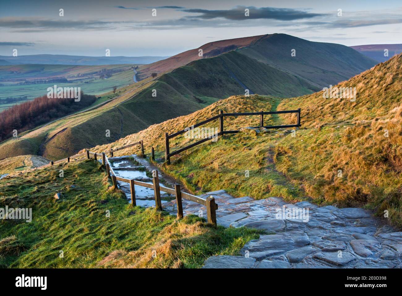 Stone path and steps leading to the summit of Mam Tor, with a view ...