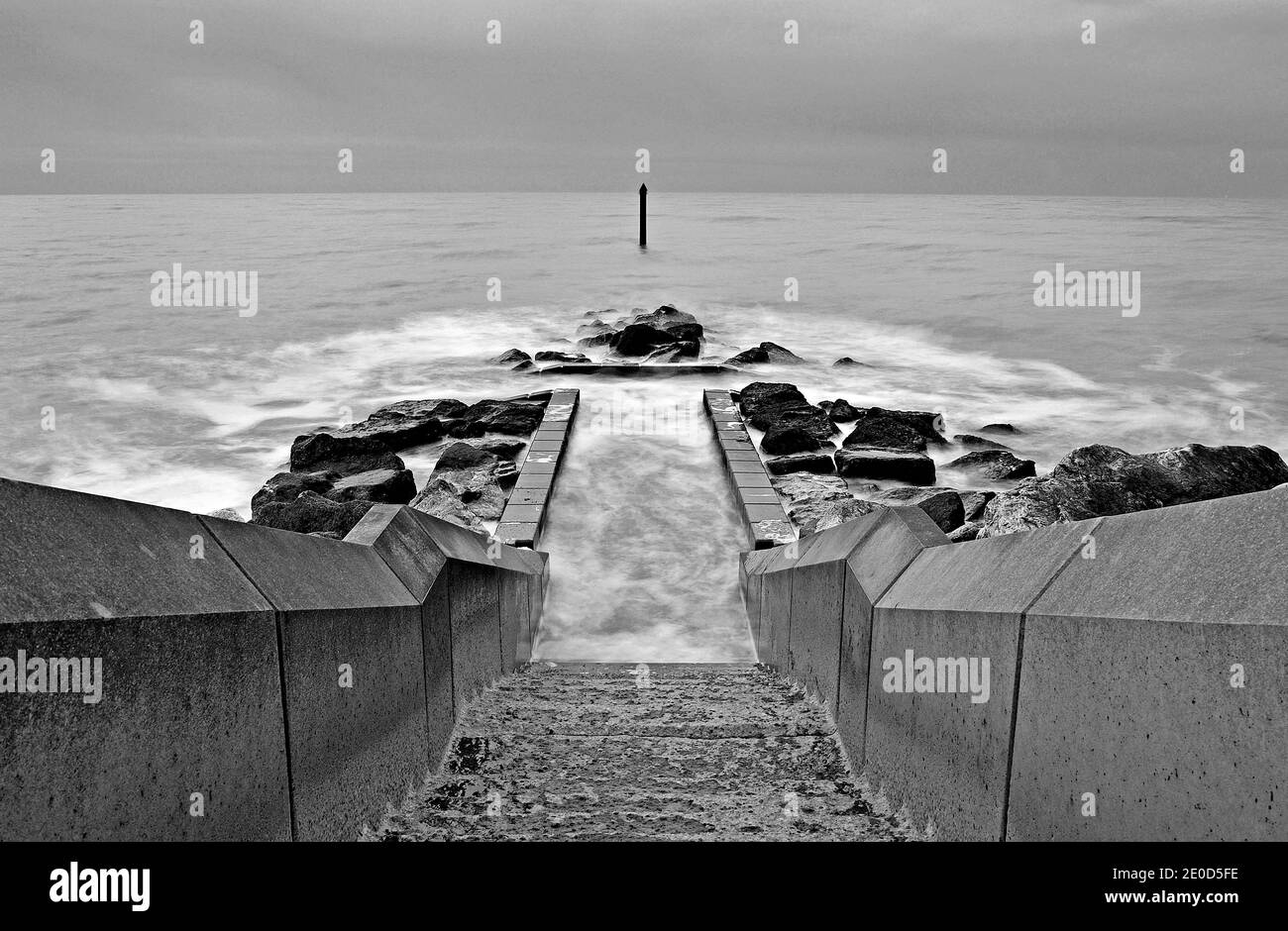 Concrete breakwater high tide hi-res stock photography and images - Alamy