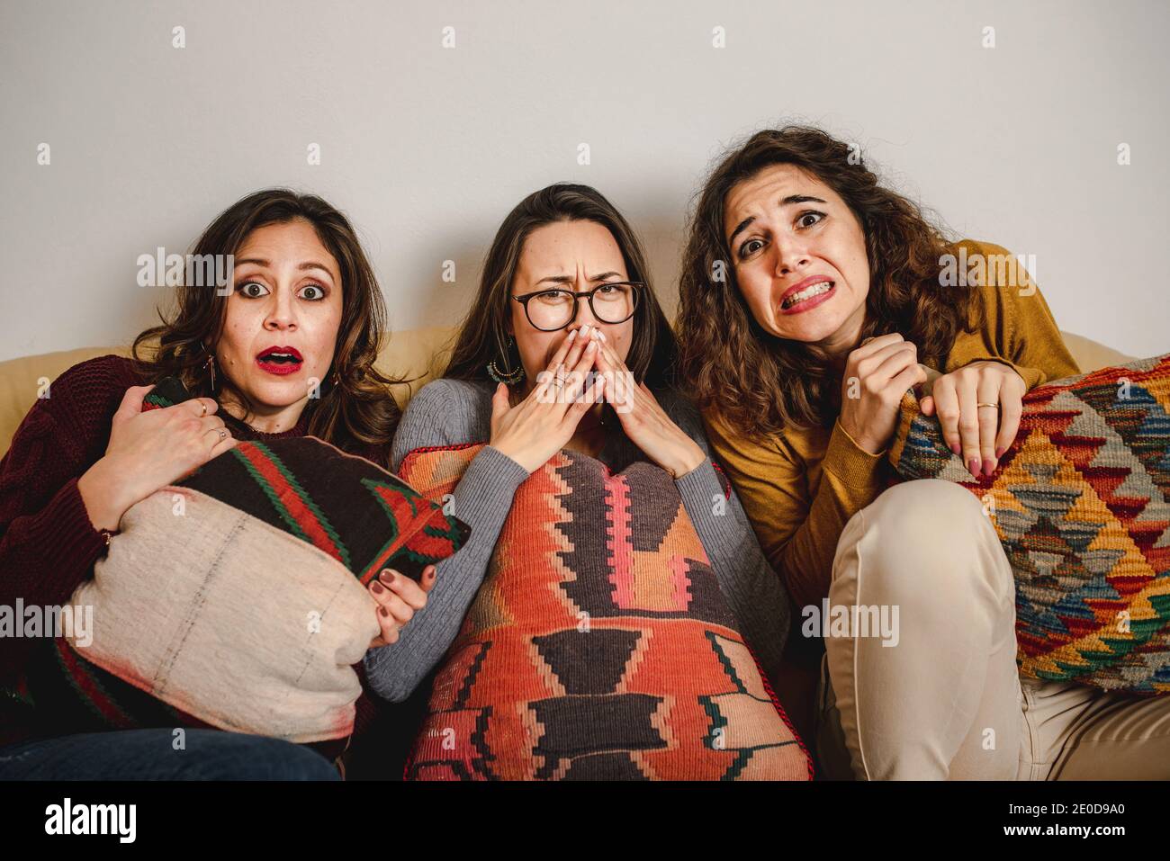 Women watching scary movie together hi-res stock photography and images ...