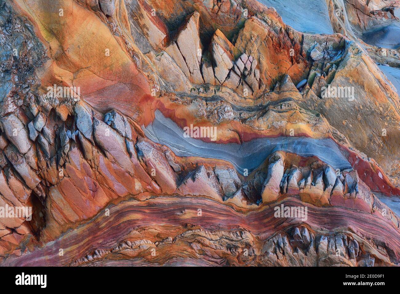Texture patterns and colors on a cliff of a beach in Asturias Stock ...