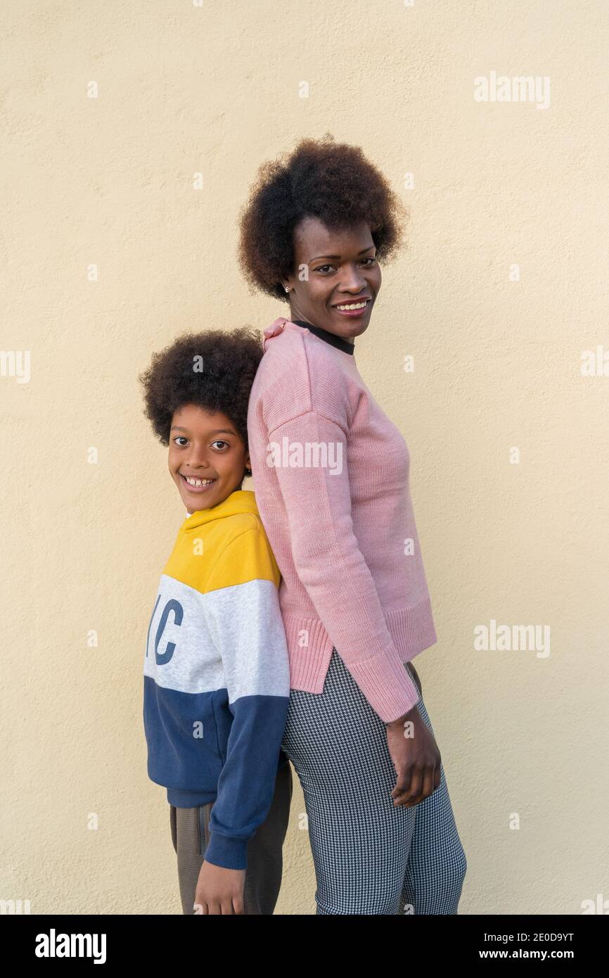 Woman boy back view street hi-res stock photography and images - Alamy