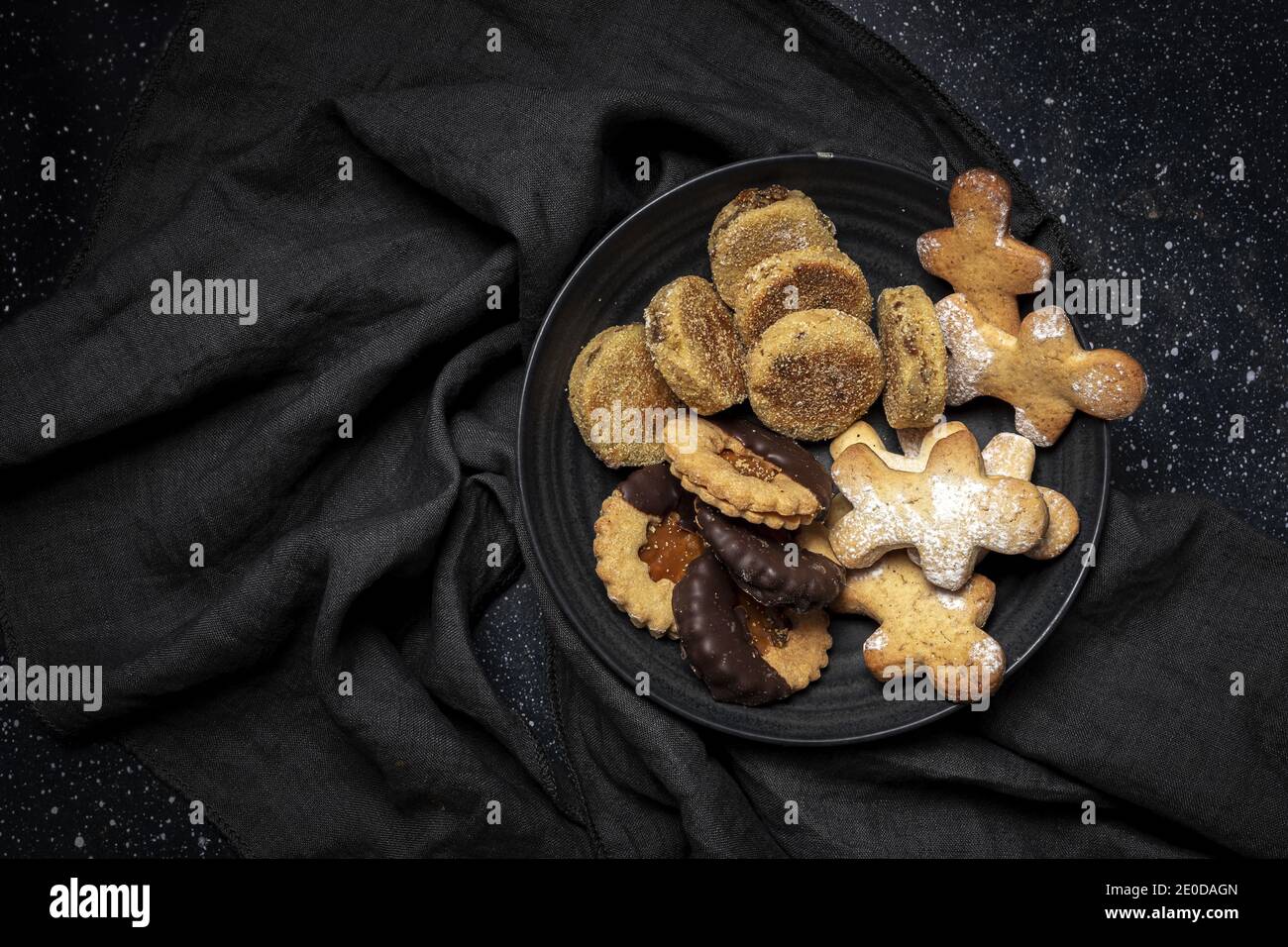 From above of delicious baked homemade cookies placed on tray on black ...