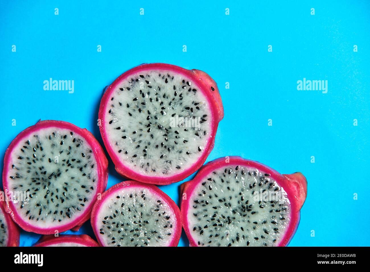 Top view of full frame background of round pieces of sweet juicy Pitaya ...