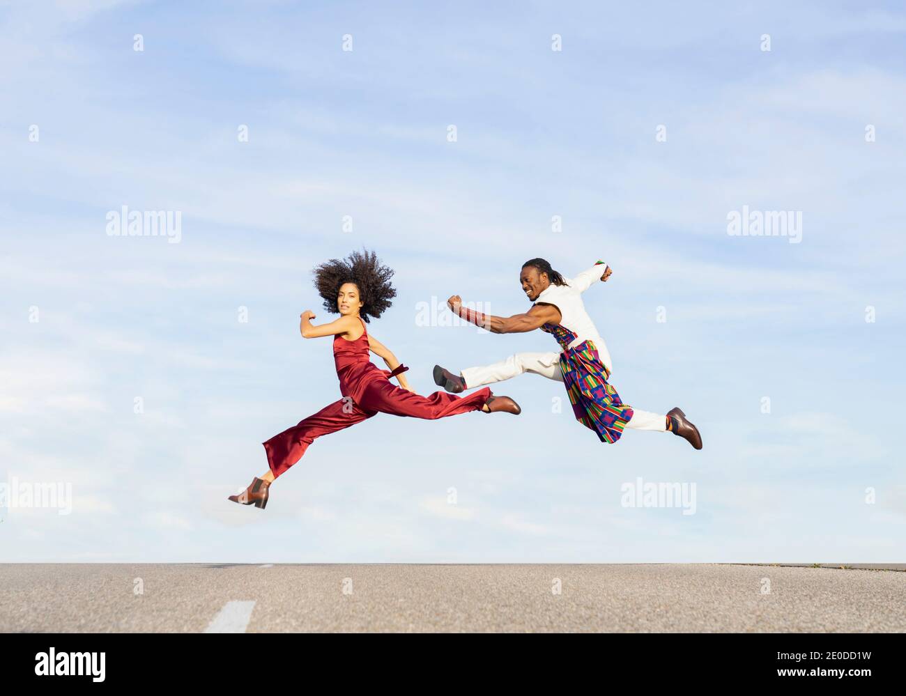 Acrobatic jump couple hi-res stock photography and images - Alamy