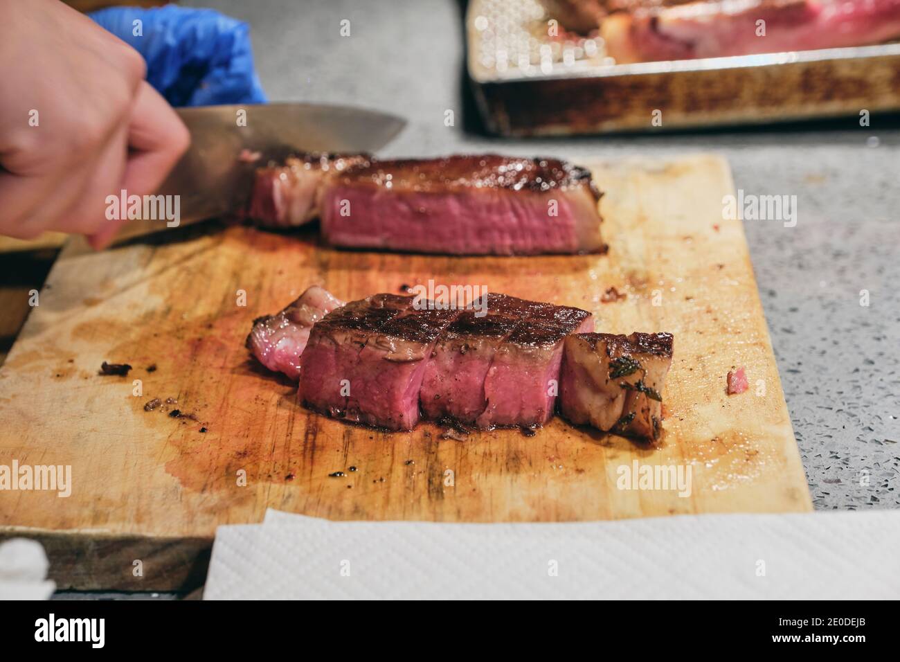 Chefs preparing beautiful dishes in French restaurant's kitchen Stock ...