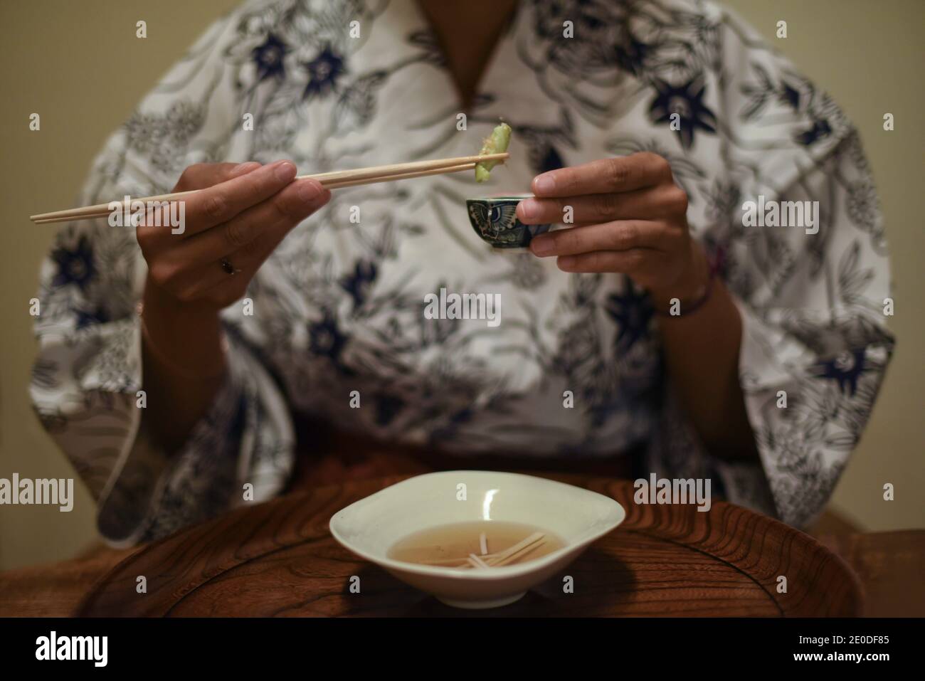 Eating traditional japanese food kimono hi-res stock photography and ...