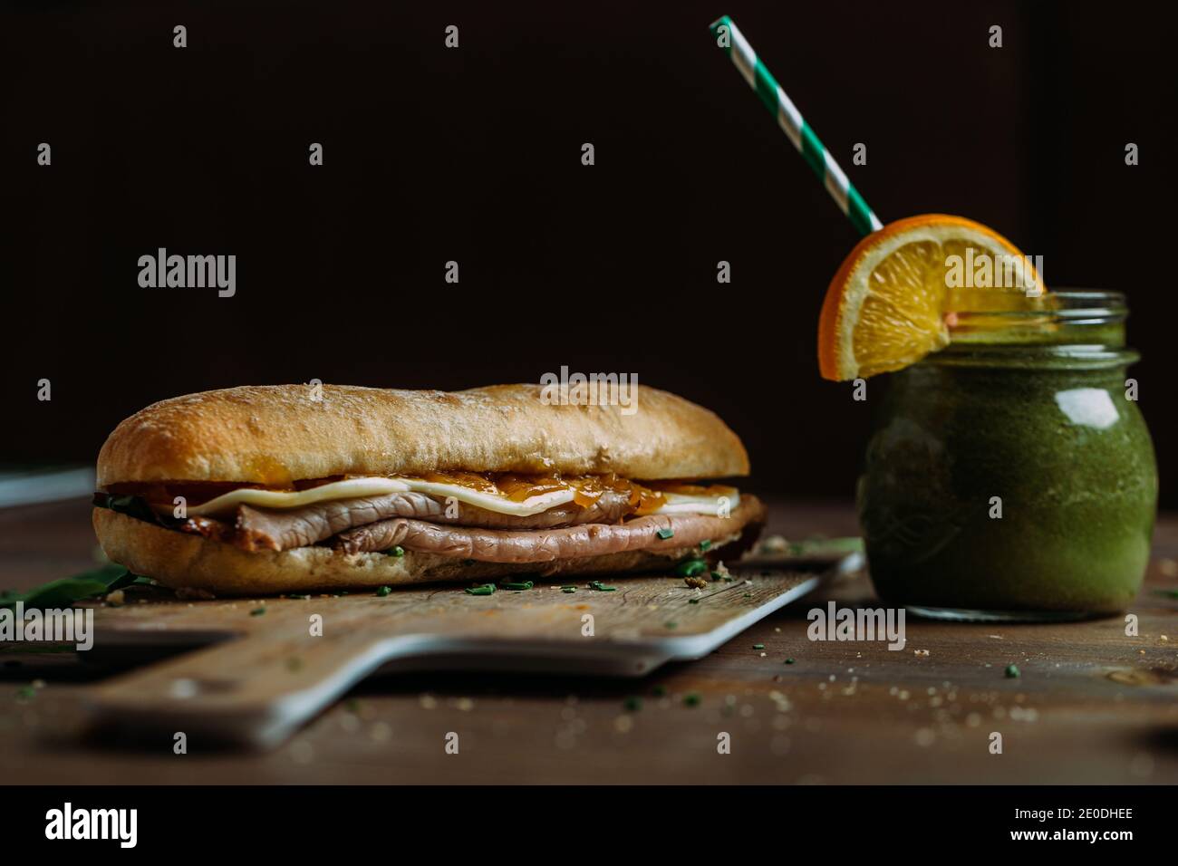 Healthy sandwich of roast beef with vegan smoothie Stock Photo - Alamy