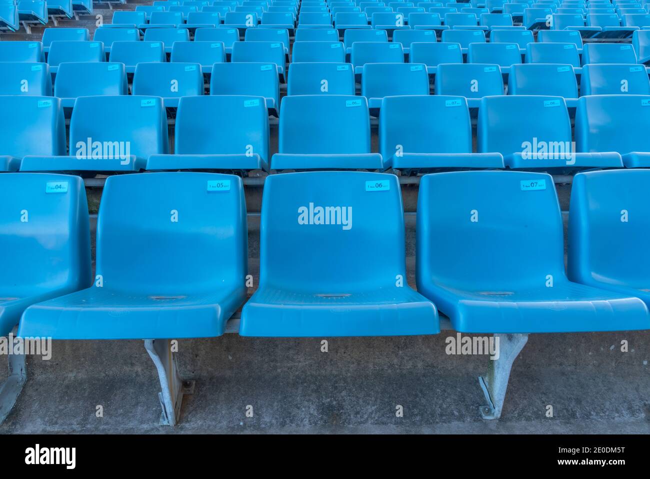 Blue seats at a football stadium Stock Photo - Alamy