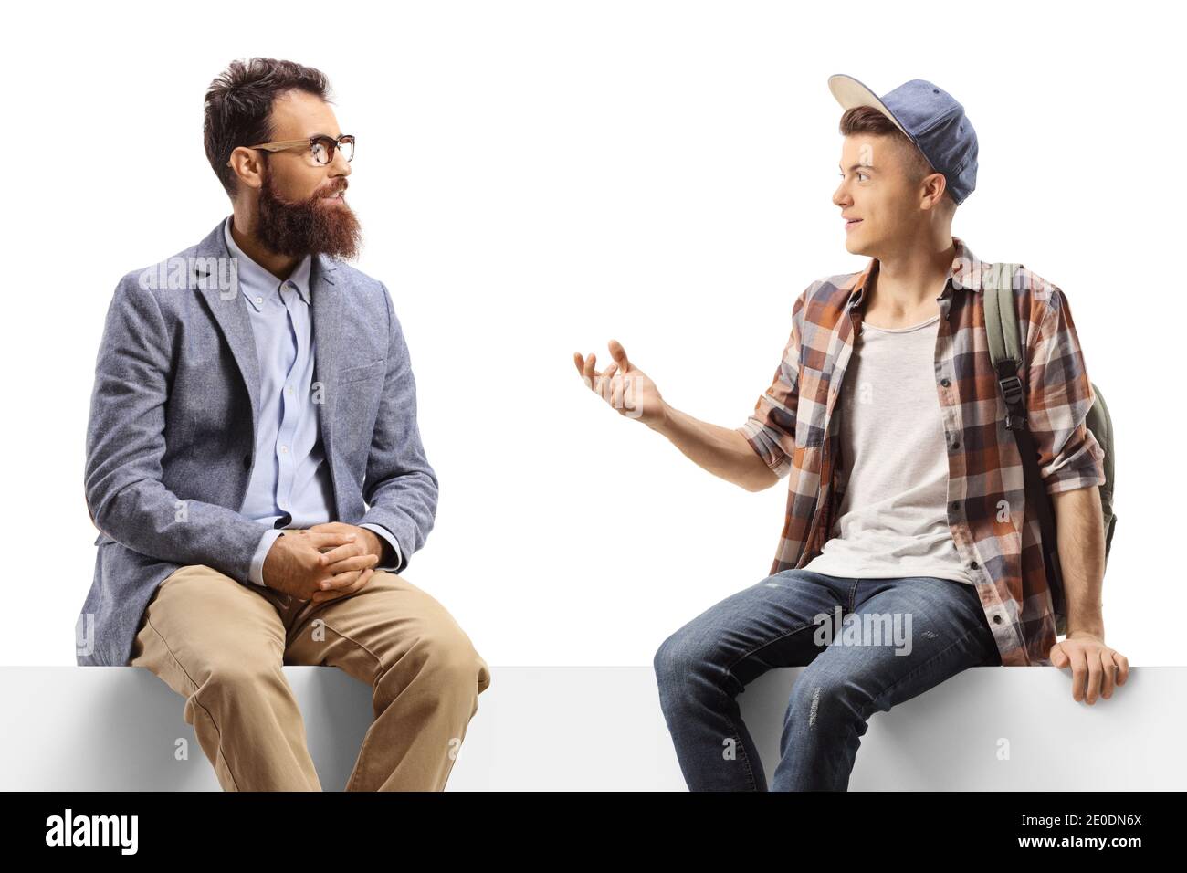Man and a teenage male student sitting on a panel and talking isolated ...
