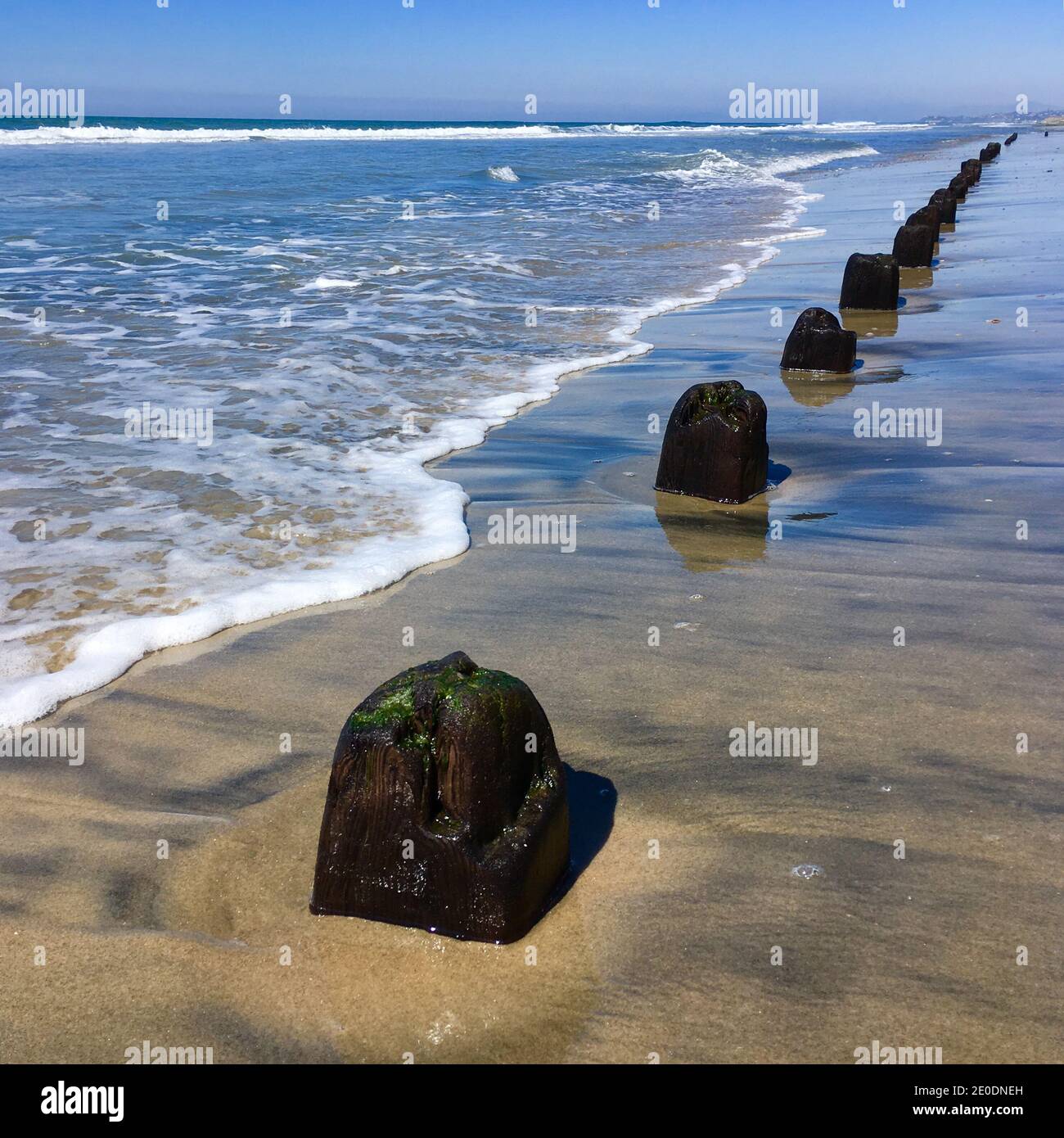 Old Wooden Ruins on Beach Stock Photo - Alamy