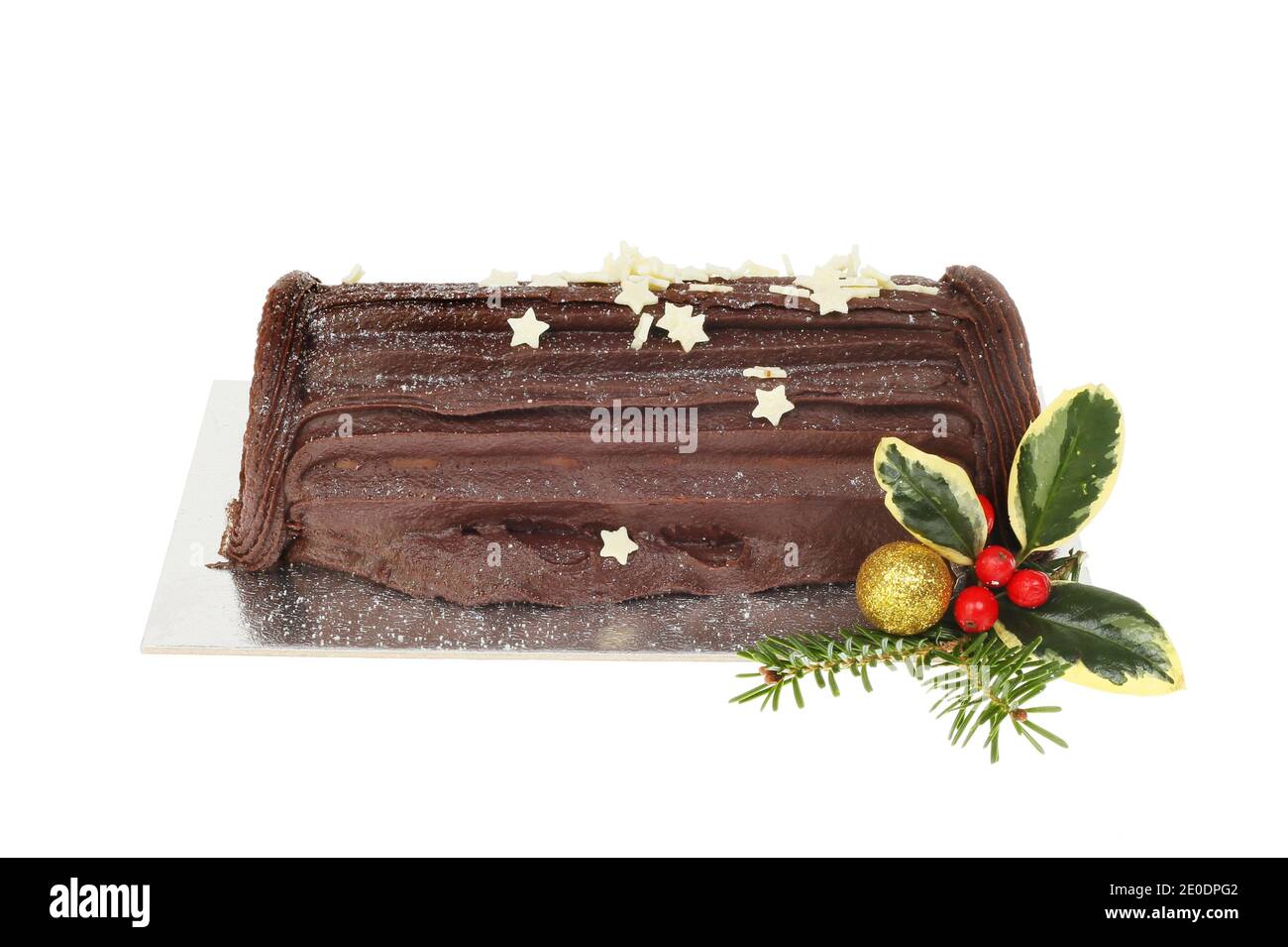 Chocolate yule log decorated with seasonal foliage Stock Photo - Alamy