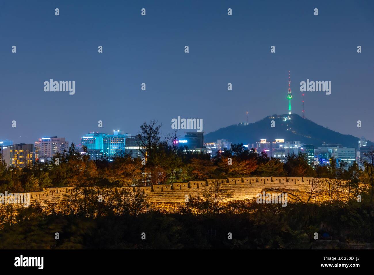Namsan tower viewed behind an ancient wall at Inwangsan mountain in ...