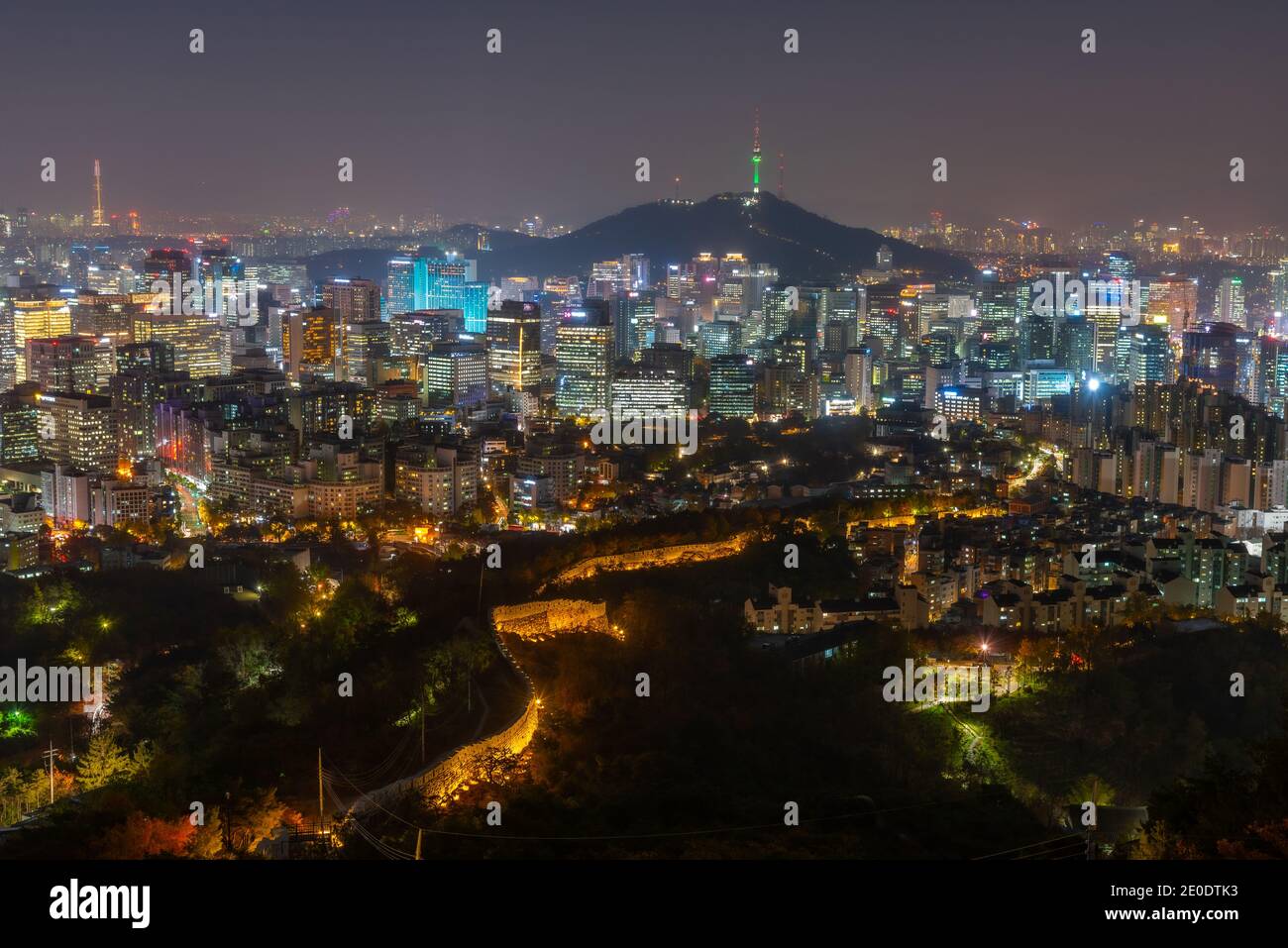 Namsan tower viewed behind an ancient wall at Inwangsan mountain in ...