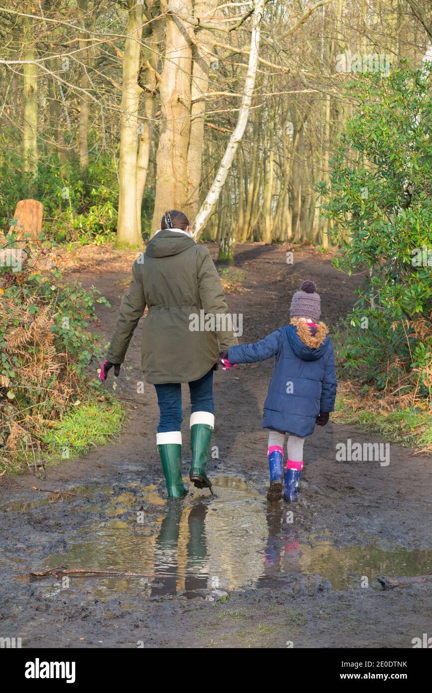 Child wearing wellington boots standing hi-res stock photography and ...