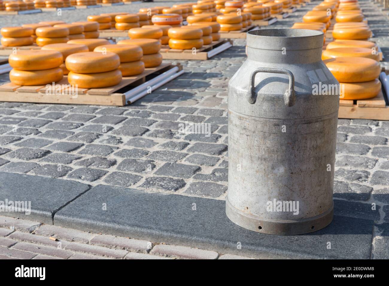 Milk Canister and Gouda Cheese Stock Photo - Alamy