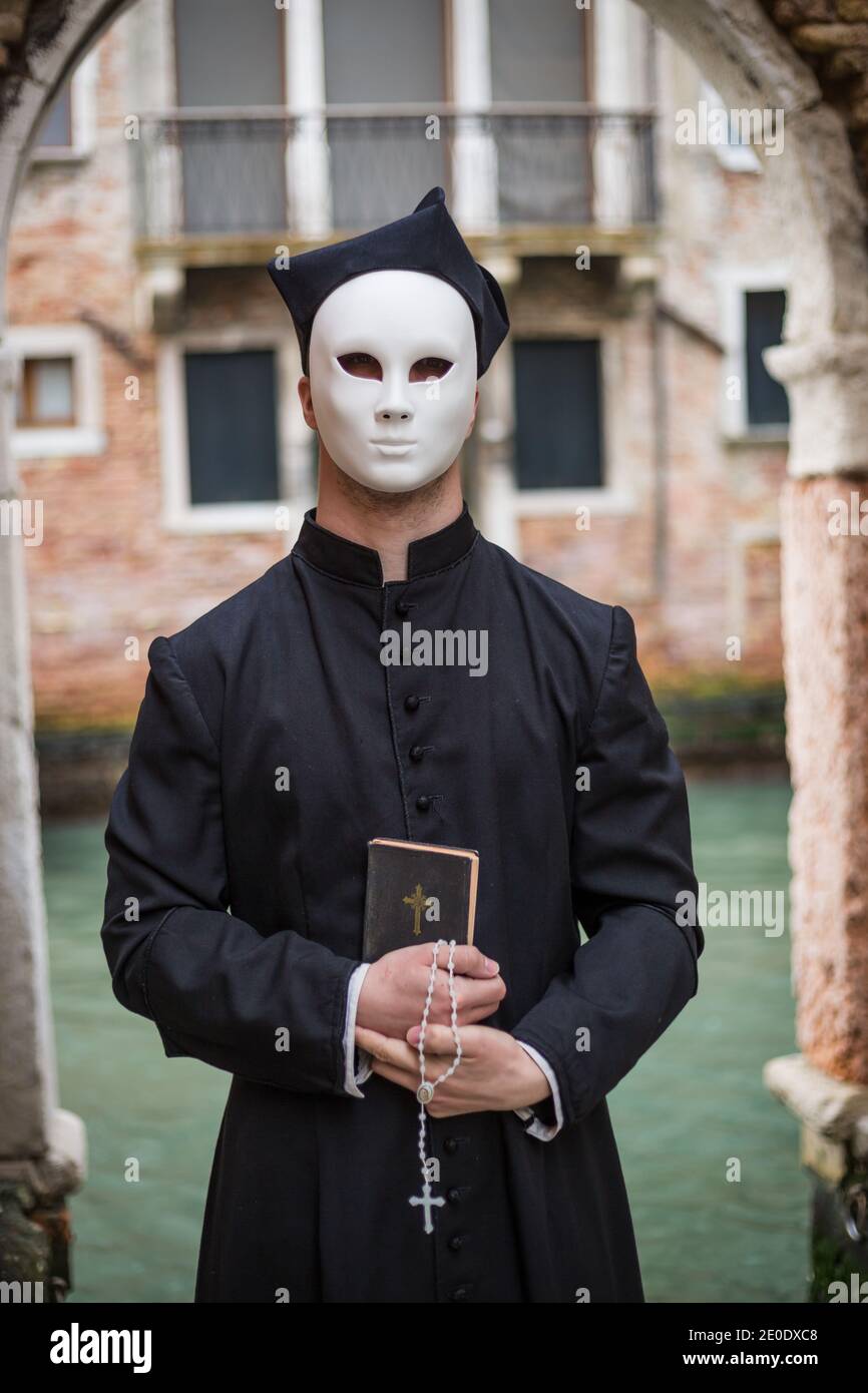 Young christian priest wearing hi-res stock photography and images - Alamy