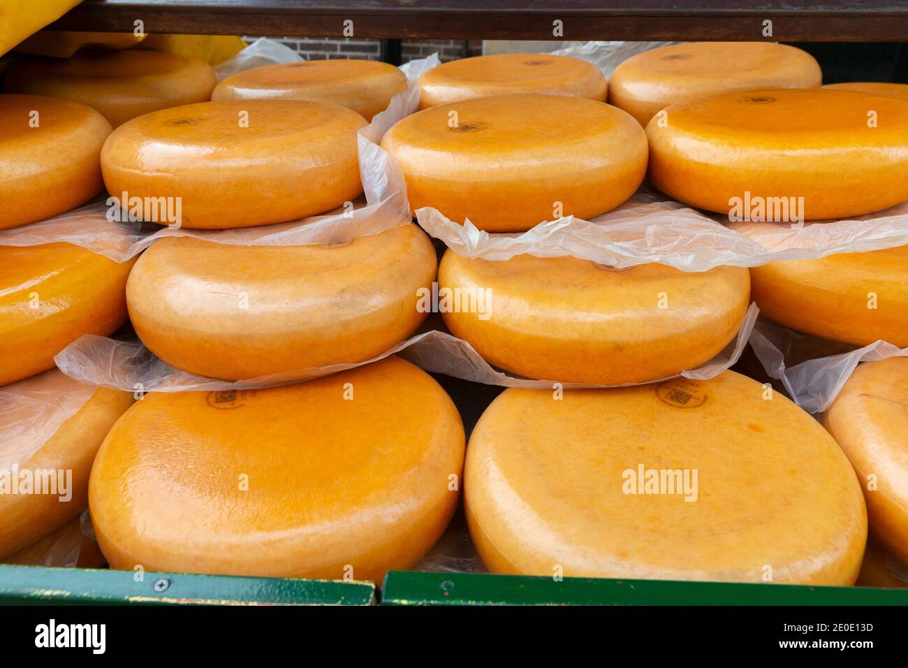Wheels of Gouda Cheese stacked in a wagon after the market Stock Photo ...