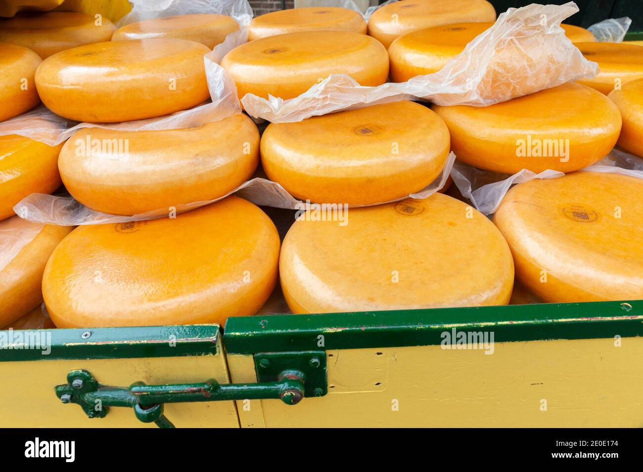 Wheels of Gouda Cheese stacked in a wagon after the market Stock Photo ...