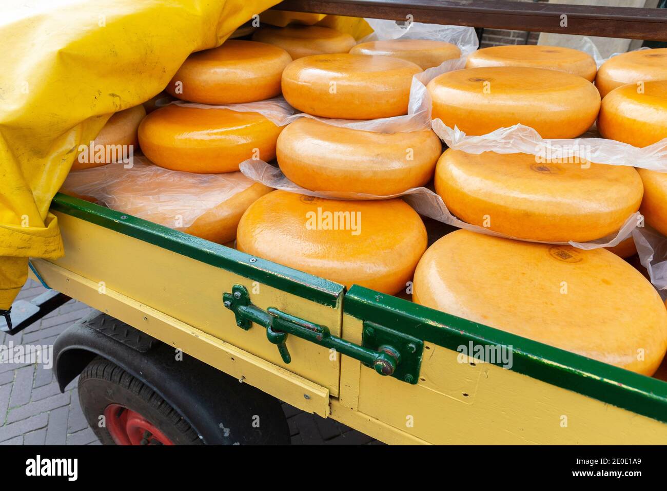 Wheels of Gouda Cheese stacked in a wagon after the market Stock Photo ...