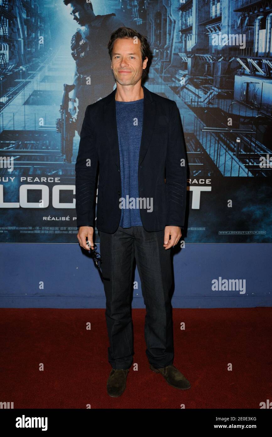 Guy Pearce attending the premiere of 'Lock out' held at the UGC Cine ...