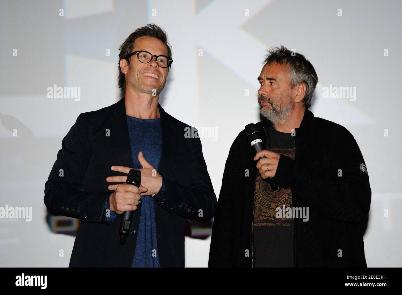 Guy Pearce and Luc Besson attending the premiere of 'Lock out' held at ...