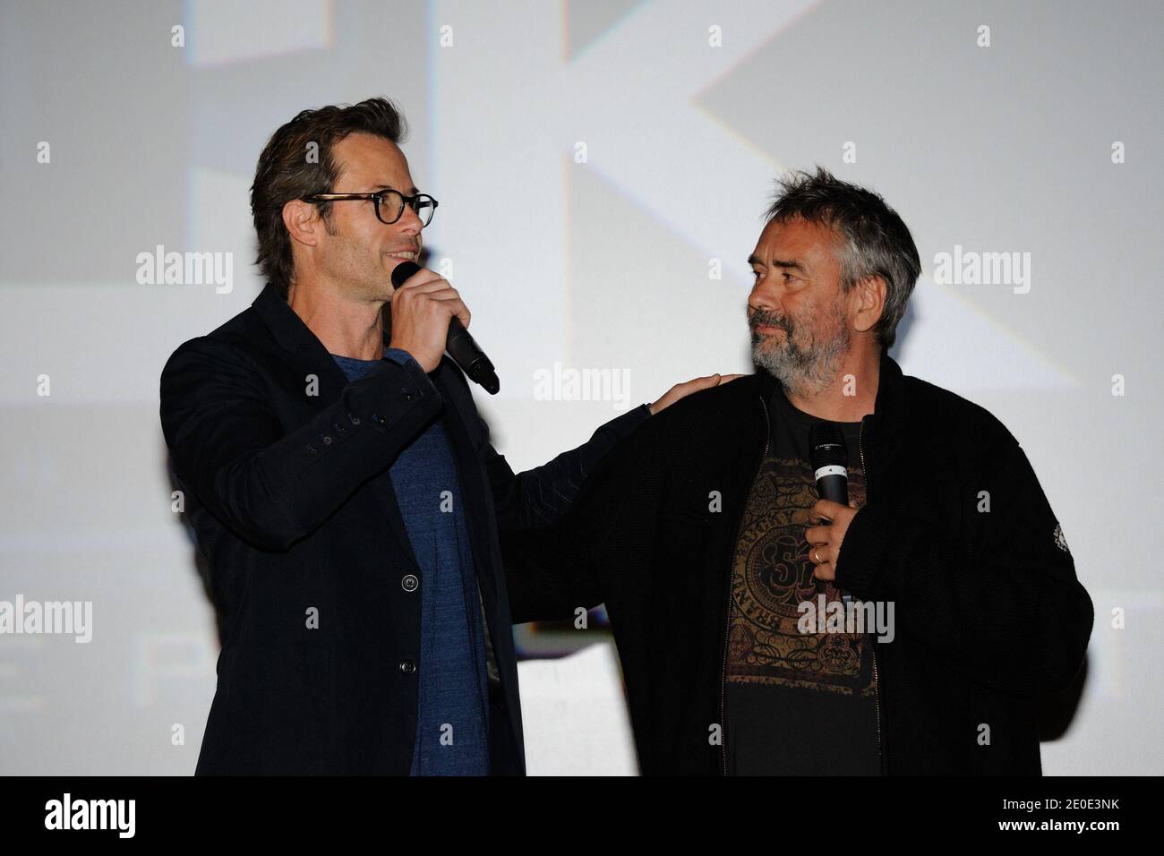 Guy Pearce and Luc Besson attending the premiere of 'Lock out' held at ...
