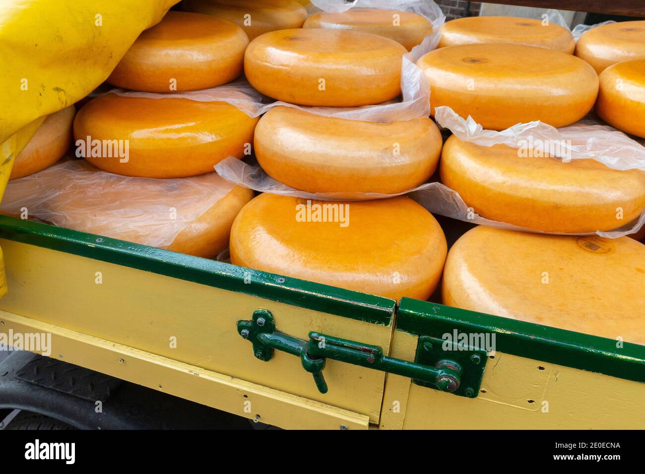 Wheels of Gouda Cheese stacked in a wagon after the market Stock Photo ...