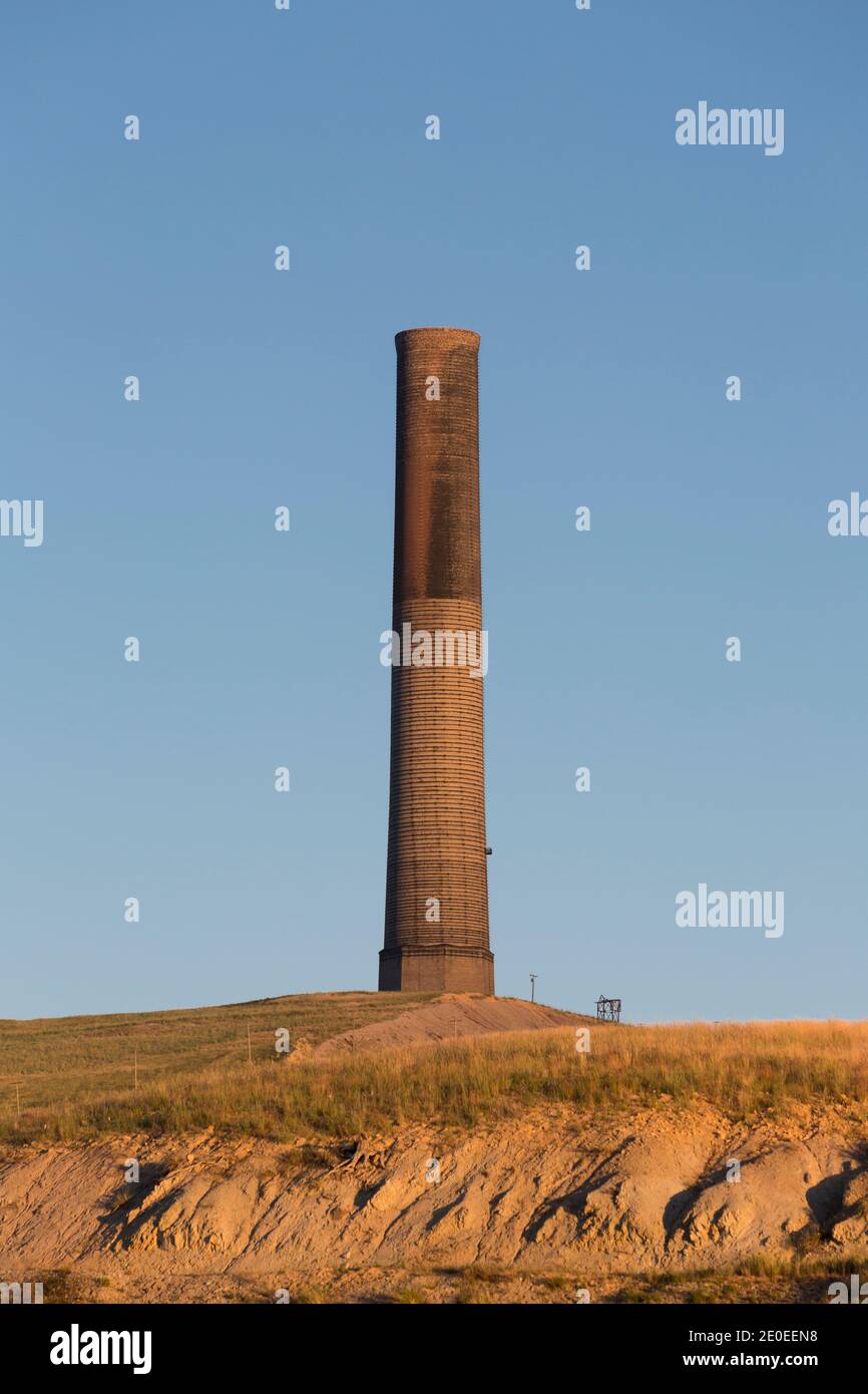 The sun sets at the Anaconda Smelter Stack in Anaconda Montana. Built ...