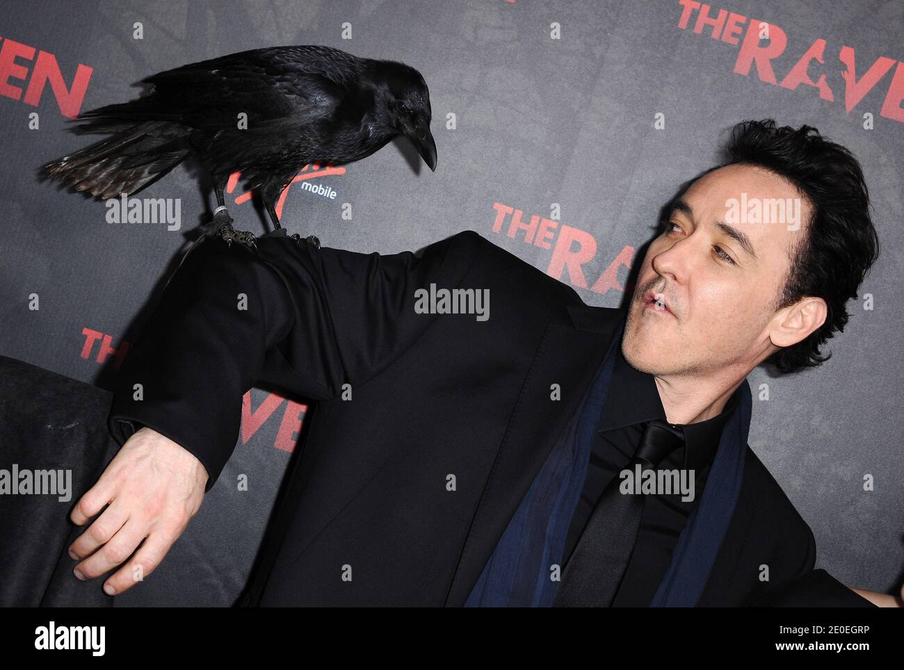 John Cusack attends the special screening of 'The Raven' in Los Angeles ...