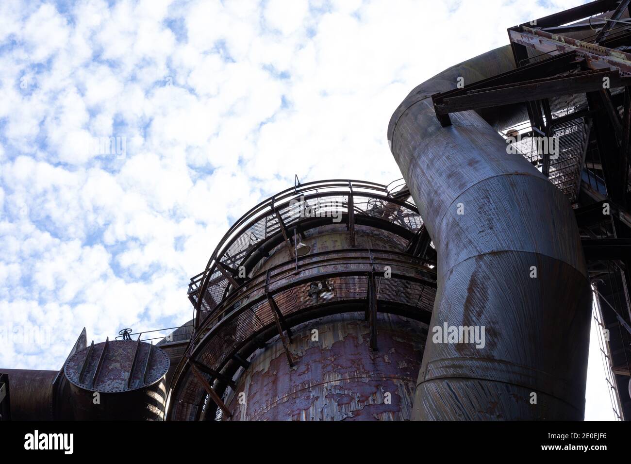 Tubes and blast furnace structure with circular grate catwalks, blue ...