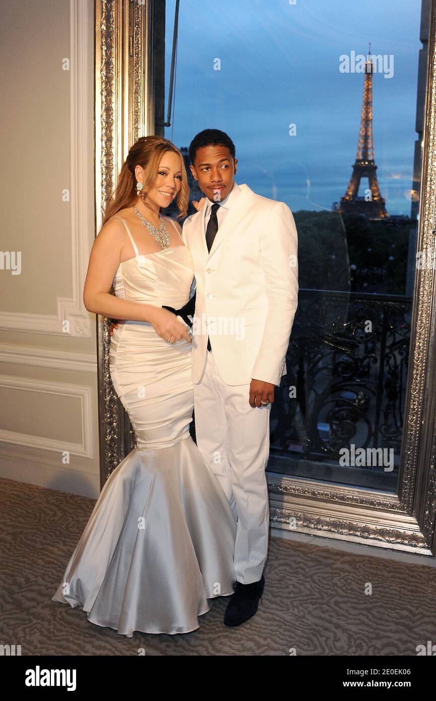 Mariah Carey and her husband Nick Cannon pose at their wedding vows ...