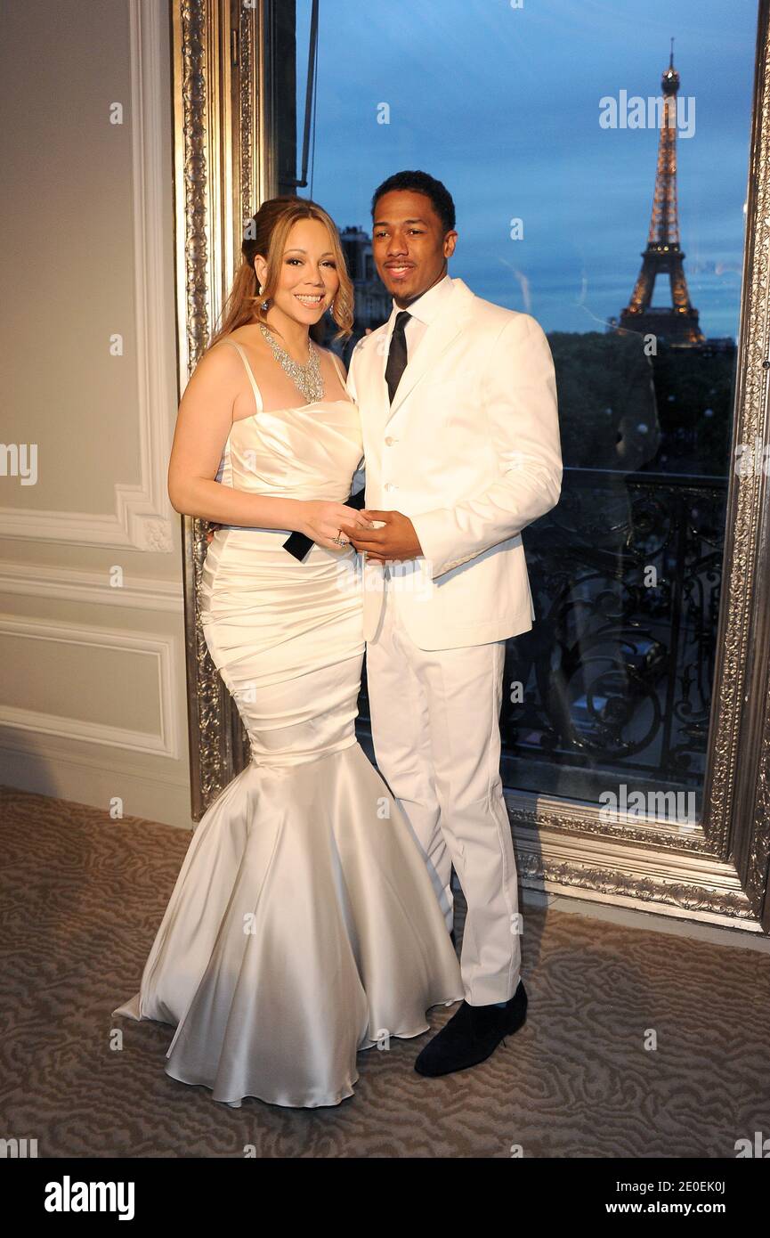 Mariah Carey and her husband Nick Cannon pose at their wedding vows ...