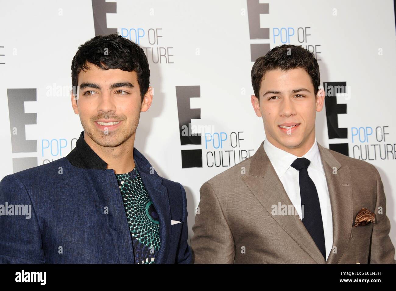 Joe Jonas and Nick Jonas attending the '2012 E! Television Network ...