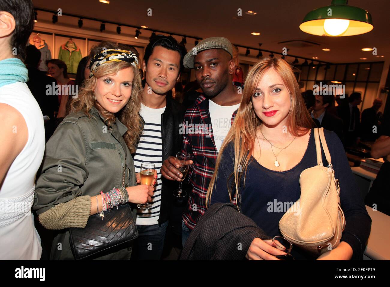 Frederic Chau and Tony Mpoudja with friends during the opening of the ...