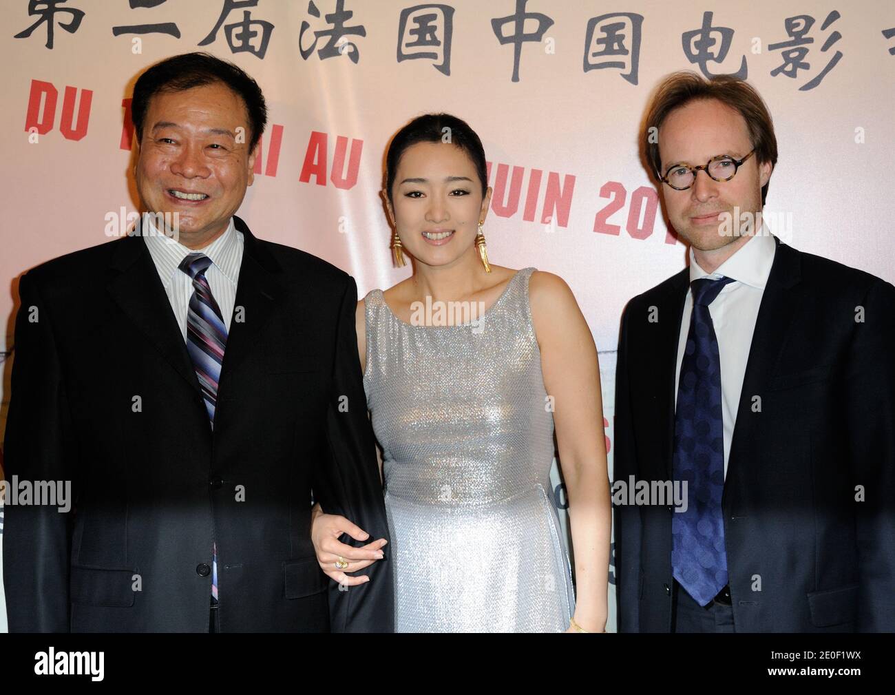 (L-R) Zhang Pimin, Gong Li and Eric Garandeau attending the opening ...