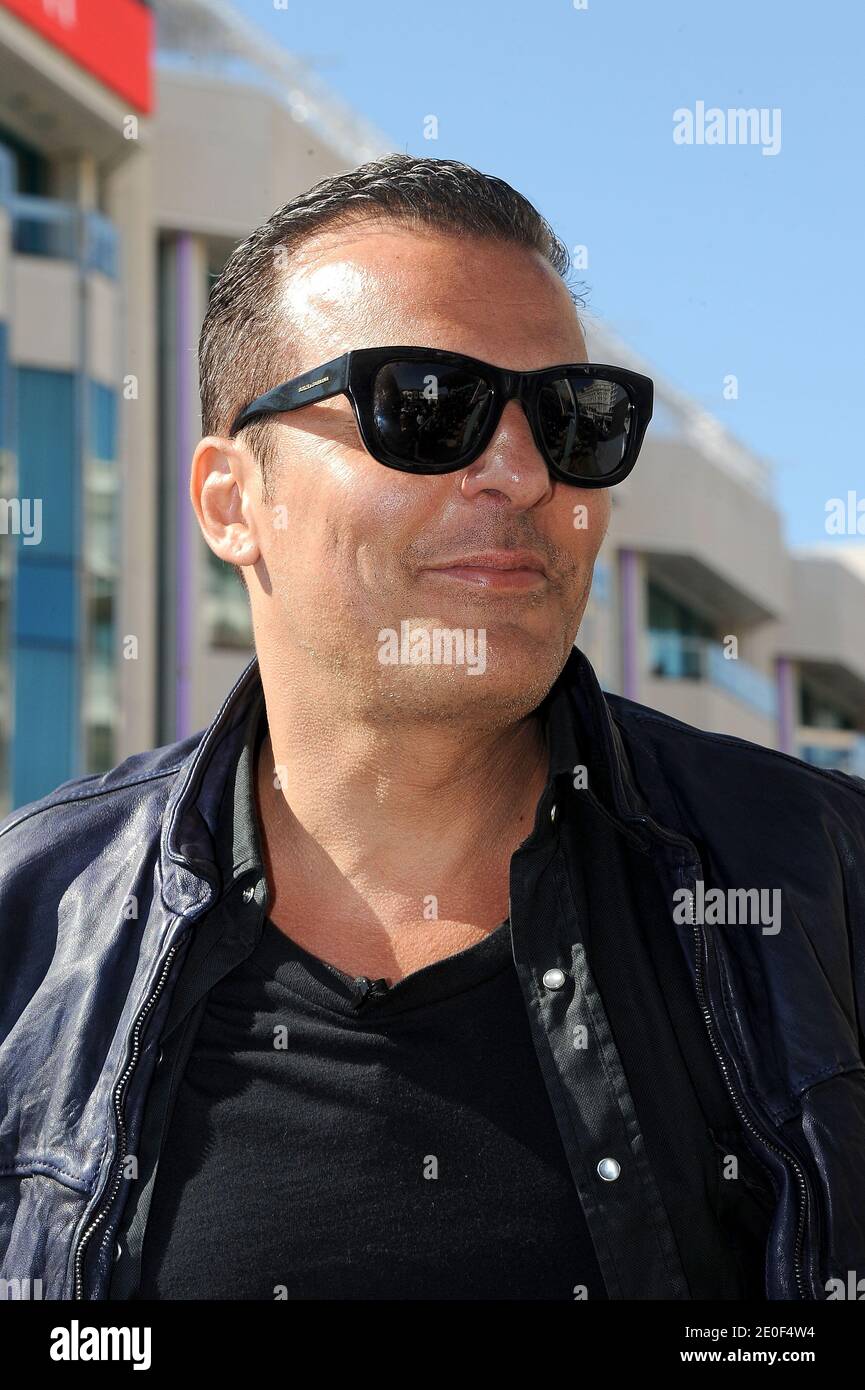 Jean Roch poses outside the VIP Room new location during the 65th ...