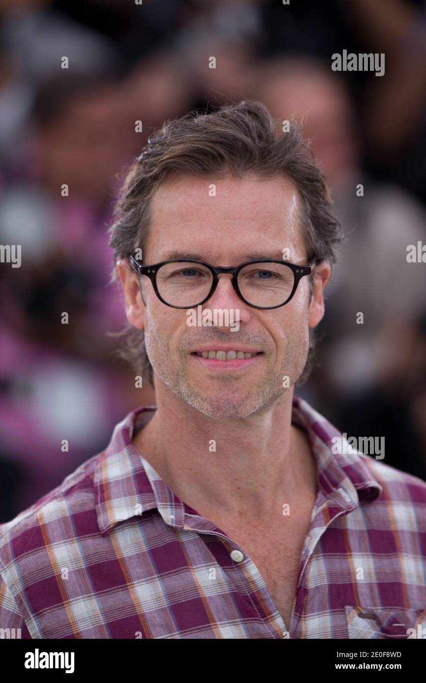 Guy Pearce posing at Lawless photocall held at the Palais Des Festivals ...