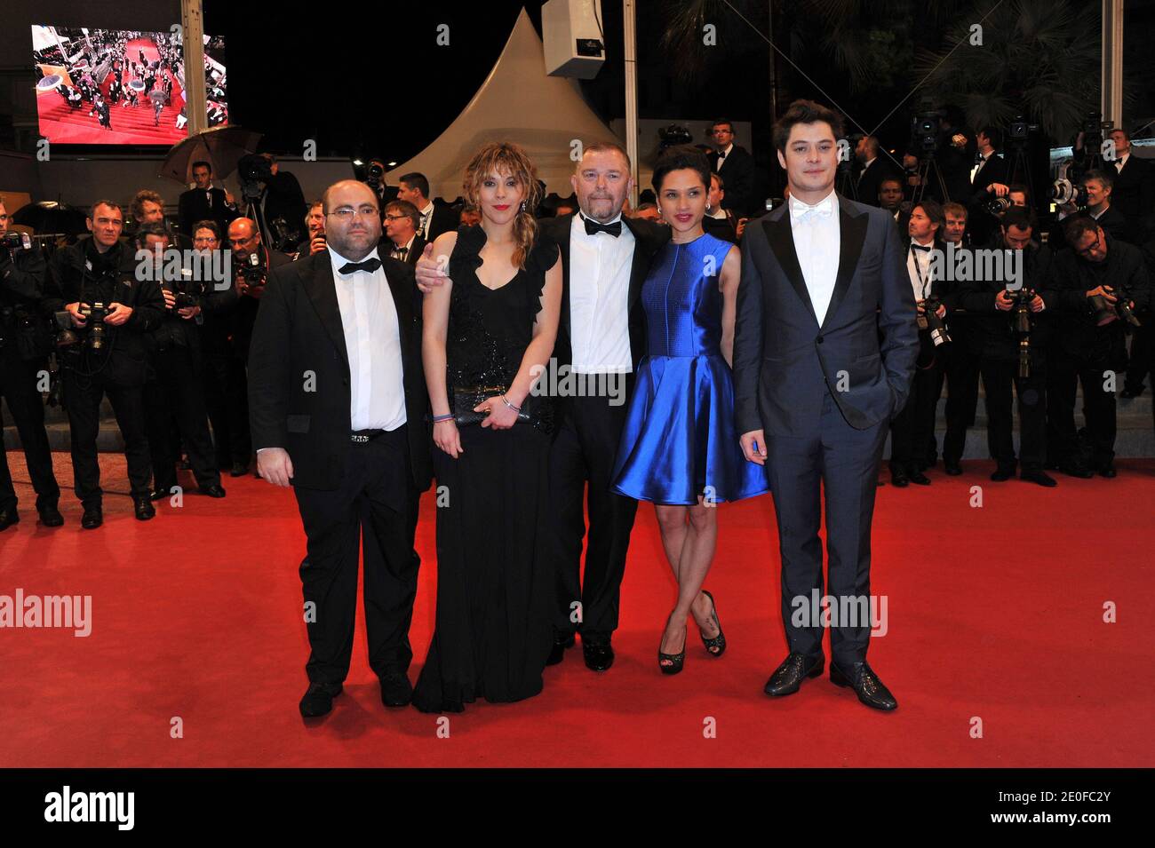 Actors Aurelien Wilk and Alysson Paradis with film crew posing before ...
